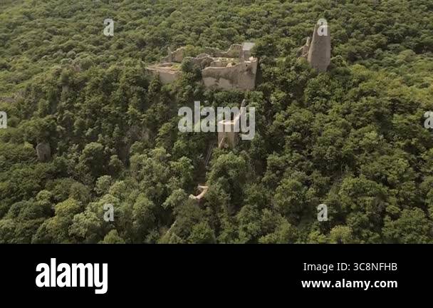 Aerial rising view Ujarma Fortress. Ancient Hilltop Royal Citadel and ...