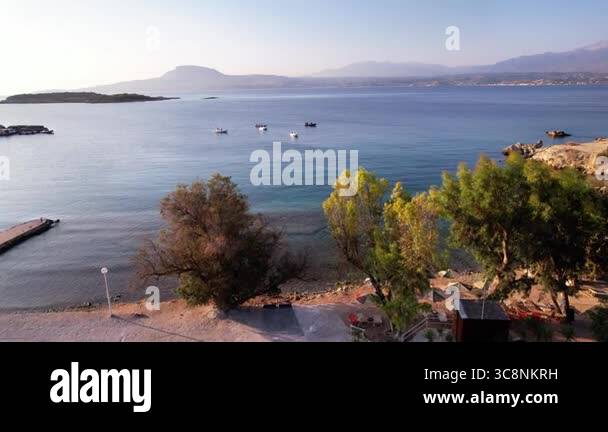 Experience the beauty of Crete Greece from above, featuring a tranquil ...