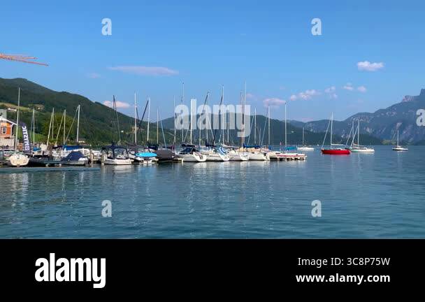 Mondsee, Upper Austria, Austria June 25, 2024: Visitors enjoy a sunny ...