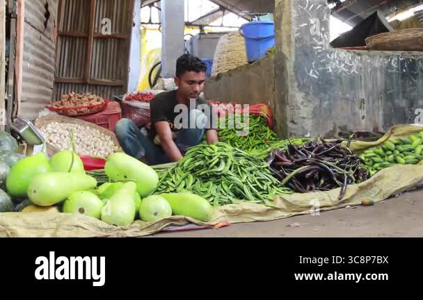 Unidentified people at the Pouro Bazar market in Rangpur, one of the major cities of Bangladesh ...