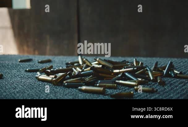 Empty shell casings on the floor after firearm training session Stock Video Footage - Alamy