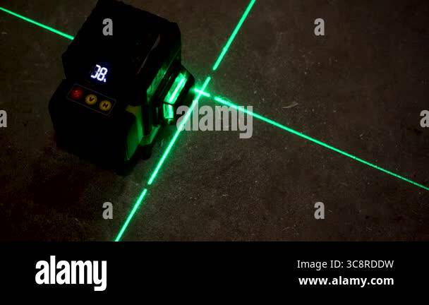 The overlapping green laser lines on the floor provide a clear guide ...