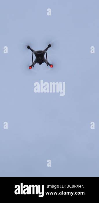 Vertical Format Video of Professional Drone Flying in the Air. Drone ...