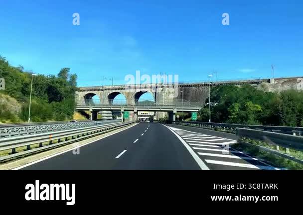 Driving car on toll road highway autobahn,entrance gates through ...