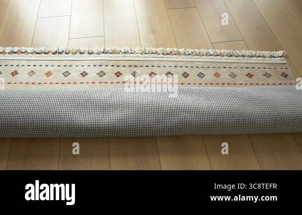 Close-up of rolled fabric with a detailed pattern for projects Stock ...