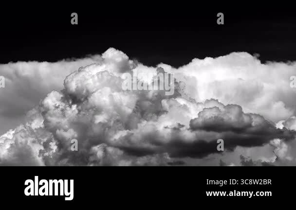 time-lapse of separate white clouds on a black background Stock Video ...