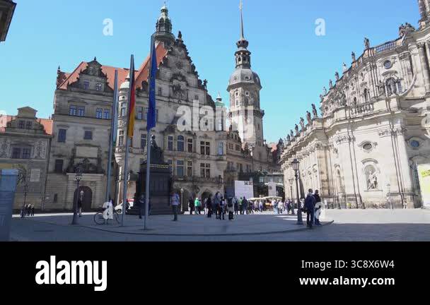 The main square in Dresden with historic buildings, tourists and open ...