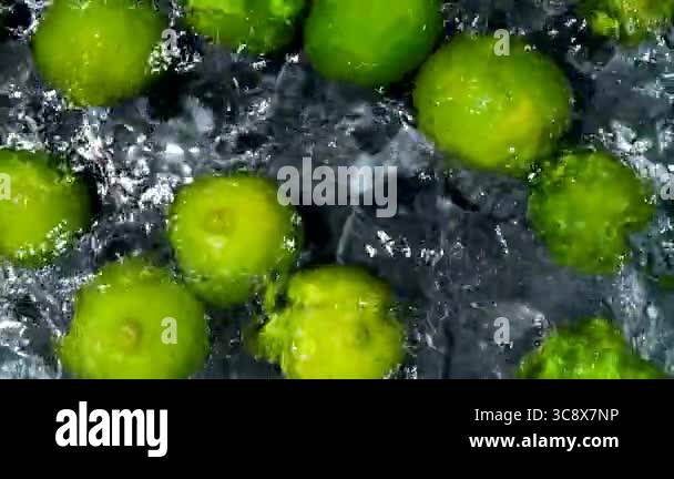 Whole Limes Drifting in Water with Soft Ripples Slow Motion Stock Video ...