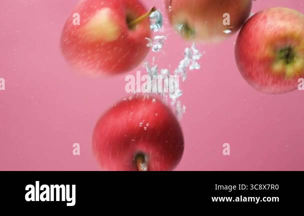 Dropping Apples in Clear Water. Fruit with Bubbles Stock Video Footage ...