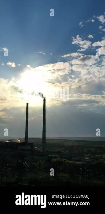 Industrial shadow on the sunset. Aerial view of factory shadow ...