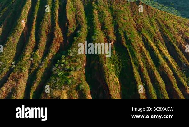Ribbed slopes of the mountain covered with moss and lichens. Rise to ...