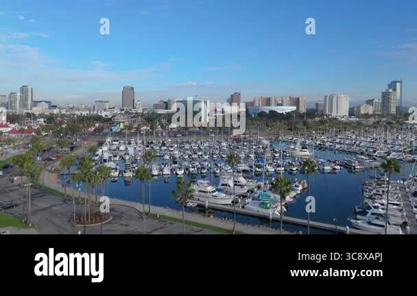 Aerial view of Long Beach Shoreline Marina at dawn with clouds in the ...