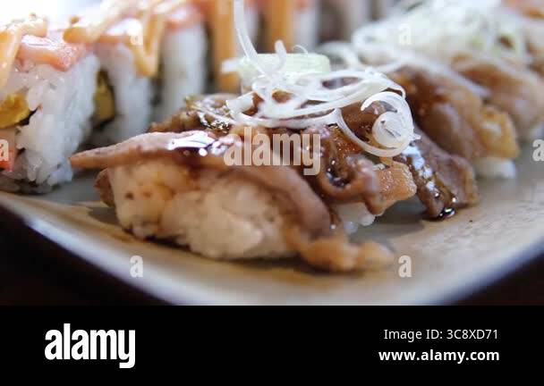 sushi with pork with beef fried meat with salmon grilled red fish ...