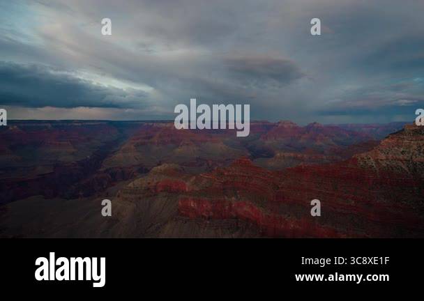Time lapse of fading light over the Grand Canyon, soft clouds drift ...