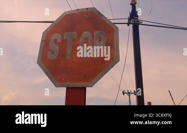 Traffic sign says STOP Stock Video Footage - Alamy