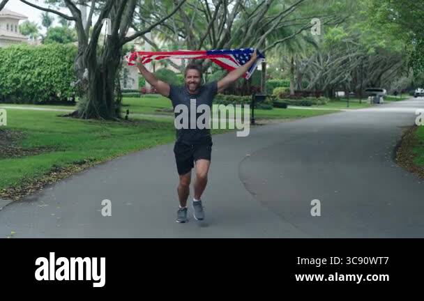 Runner with American flag at sport run. Man runner running outdoor ...