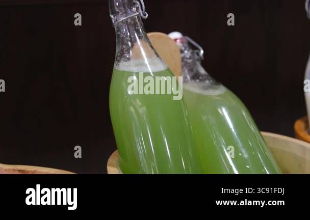 cucumber drink in a bottle in a buffet beautiful presentation. Detox ...