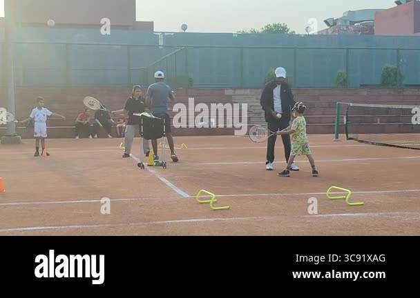 Delhi, India, February 17, 2025 - Junior tennis players having coaching ...