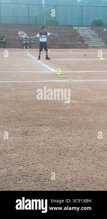 Delhi, India, February 17, 2025 - Junior tennis players having coaching ...