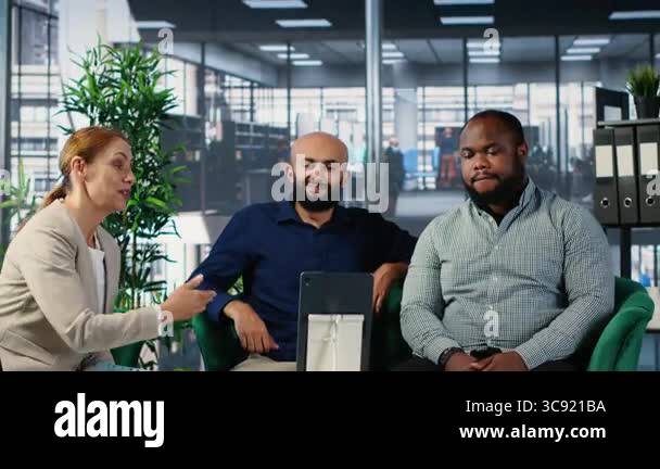Corporate meeting where multicultural partners collaborate through ...
