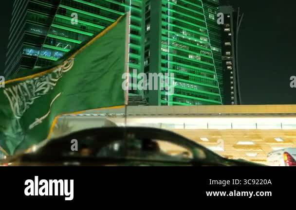 Saudi Flag Waving at Night During National Day Celebration. Close-up of ...
