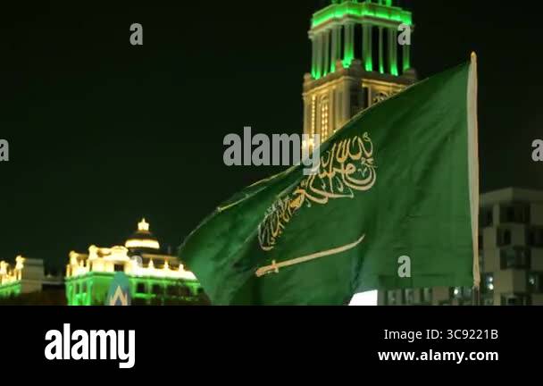 Saudi Flag Waving at Night During National Day Celebration. Close-up of ...