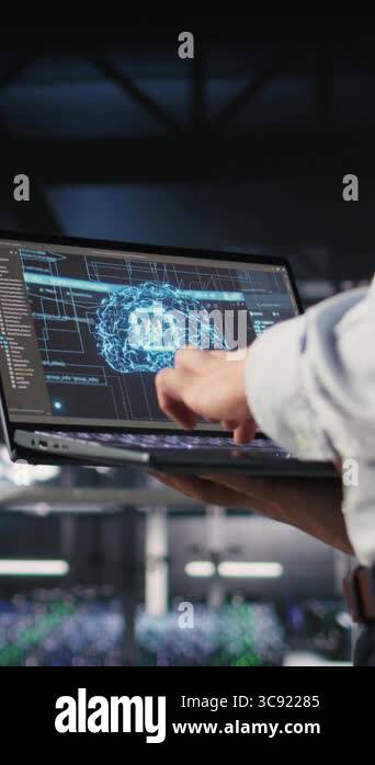 Vertical video Close up of IT specialist in server room doing AI deep ...