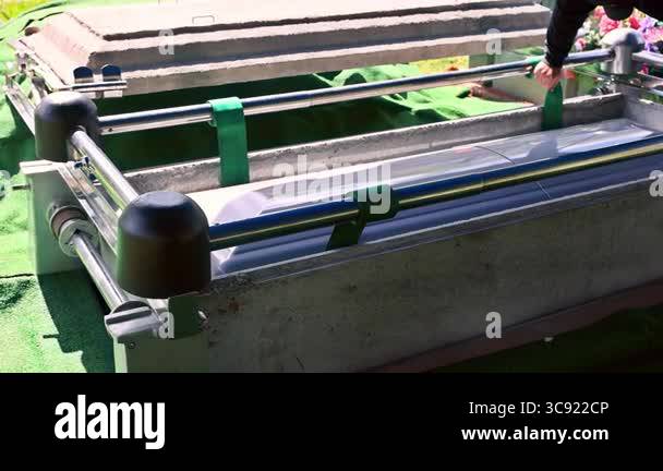 Graveside casket Stock Videos & Footage - HD and 4K Video Clips - Alamy