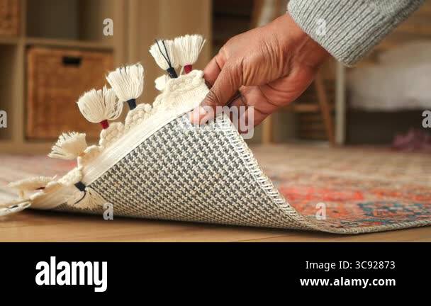 Learn how to properly roll and store a woven rug for preservation Stock ...