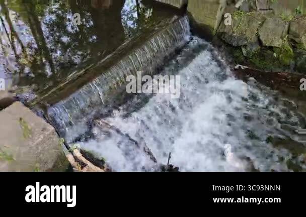 turbid water during the flood falls from large dams and forms a lot of ...