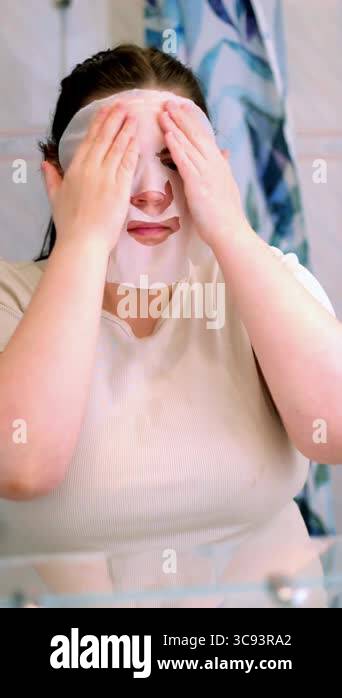 Morning skincare routine: woman doing first step of face skin cleansing ...