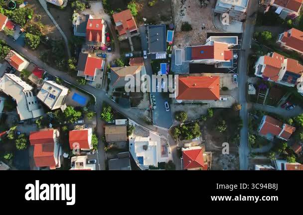 Aerial top view of Mediterranean seaside neighborhood with villas ...