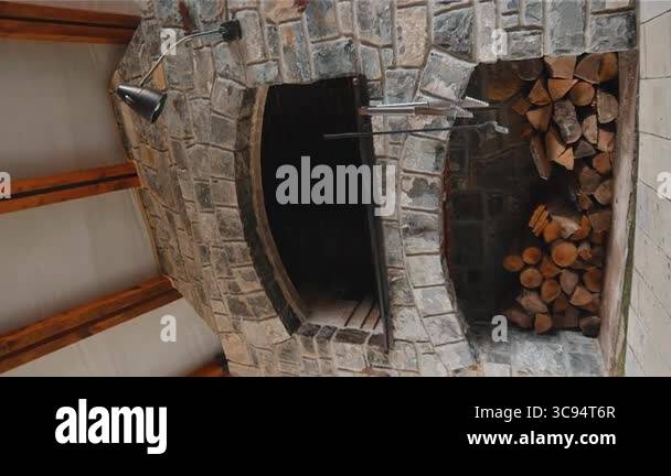 Stone barbecue firewood, open brick oven for cooking kebabs and other ...