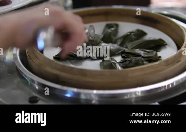 Steamed fish in banana leaves Stock Videos & Footage - HD and 4K Video ...