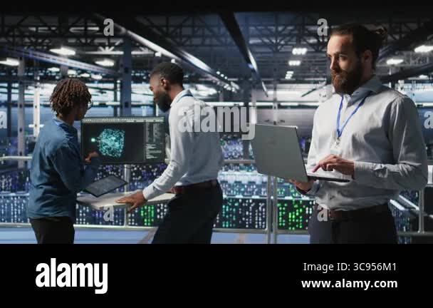 Computer scientists on data center industrial platform analyzing ...