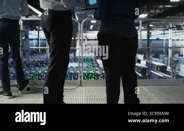 Data center manager overseeing work done by admin using neural network AI LLM visualization ...