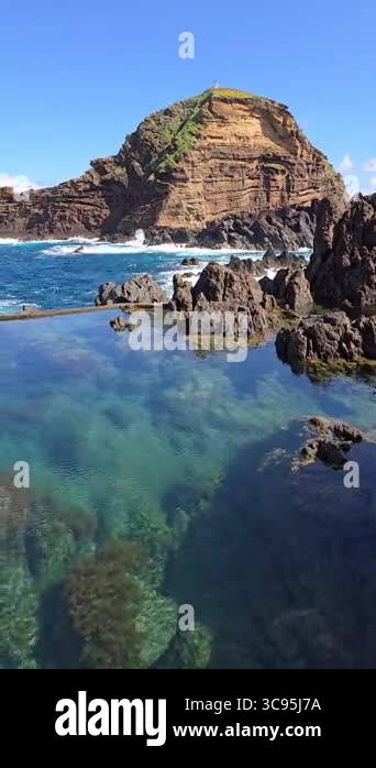 Sparkling tidal pools carved by volcanic forces in Porto Moniz, Madeira ...