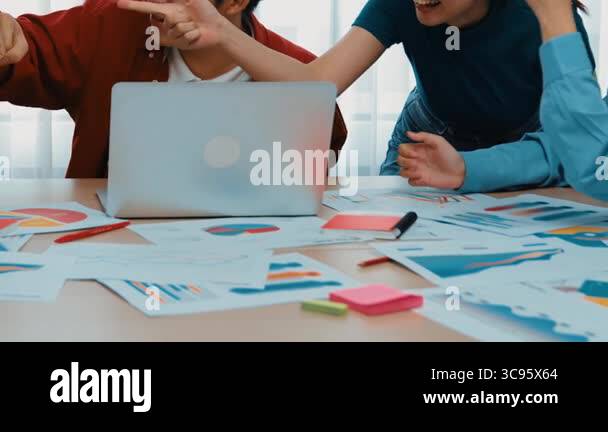 Excited and happy startup company employee celebrate after make ...