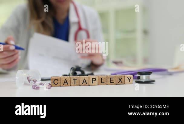 Medical doctor analyzes patient documents with Cataplexy shown on cubes diagnosis. Treatment ...