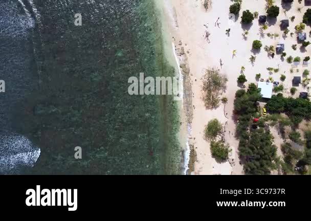 Birds-Eye Drone View of White Sand Coast and Small Island East Java ...