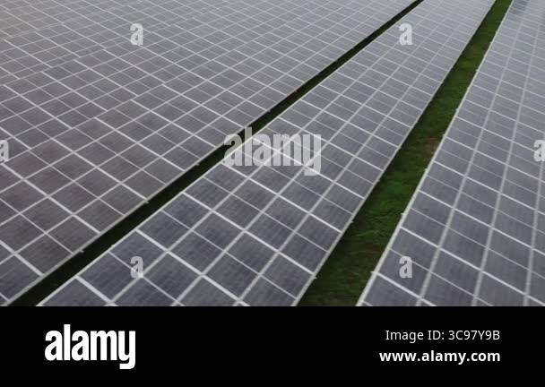 4K Aerial View of Industrial Factory with Solar Panels on Roof ...