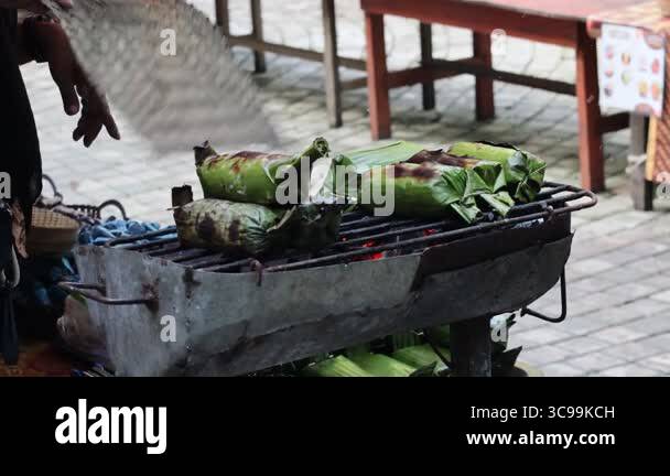 Process Baking Gogos on the grill, Gogos is a typical food from the ...