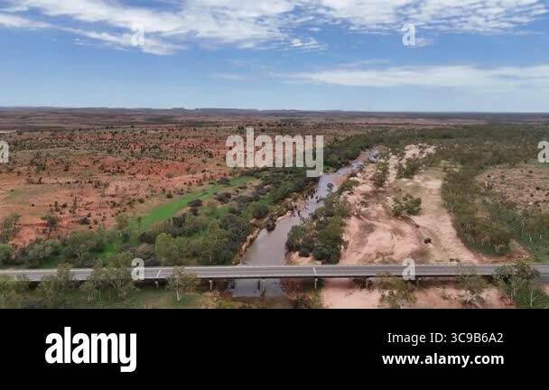 The Stuart Highway crosses the Finke River, Drone footage of the river ...