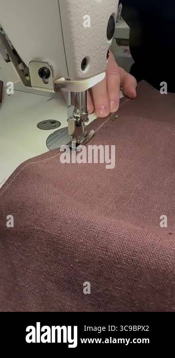 Tailoring Process: From Marking to Machine Sewing.Close-up of tailor ...