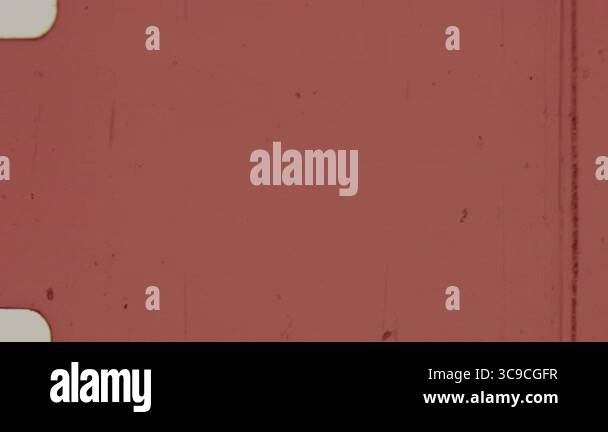 A retro-styled 8mm film overlay with a faded red tint, subtle grain ...