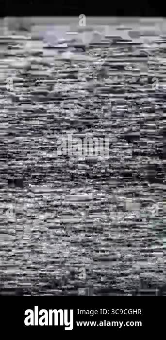 A vintage-style analog VHS tape effect featuring static glitch ...