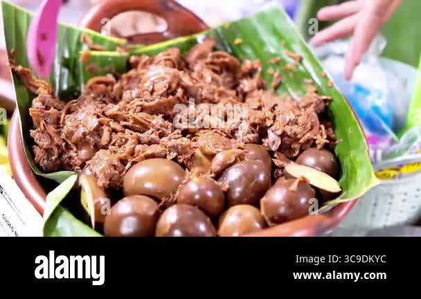 Gudeg is a typical Jogja food in Indonesia, made from young jackfruit and served with eggs, tofu ...