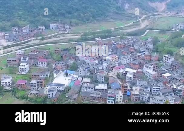 Fixed shot of a village in the valley Stock Video Footage - Alamy