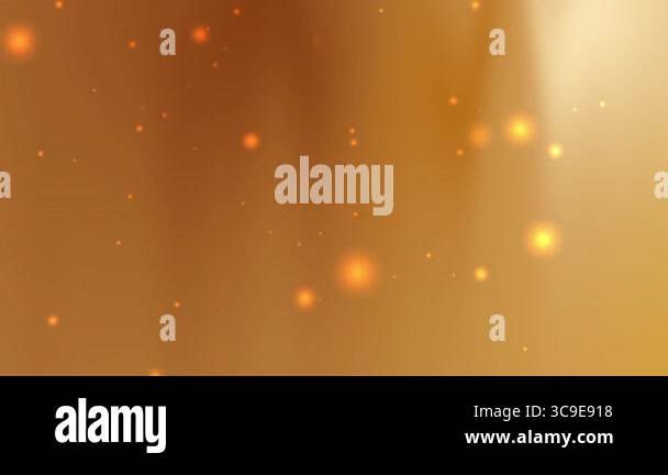 Warm golden brown gradient background with glowing soft bokeh light ...