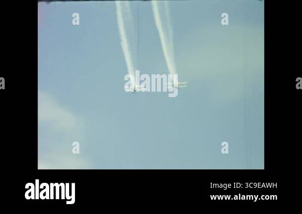 London, united kingdom may 1974, biplanes performing stunts and ...